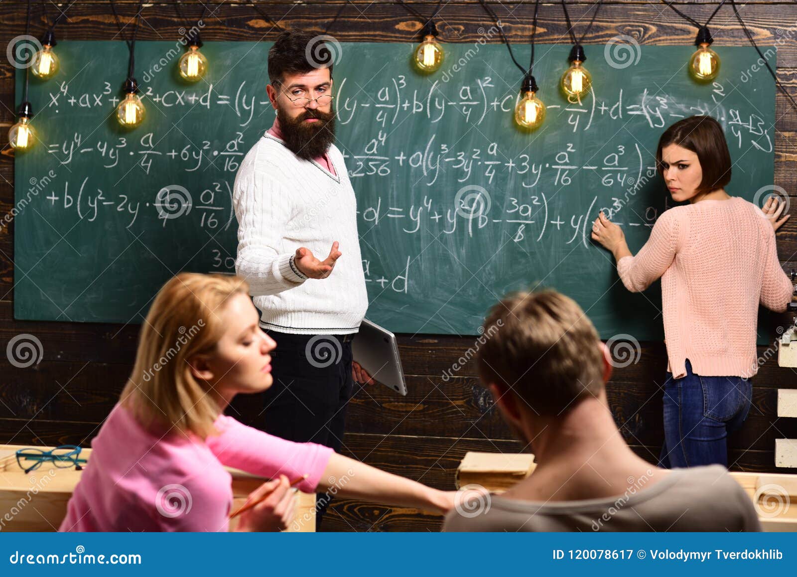 Friends Studying Together at School Classroom Solving Problem. Stock ...