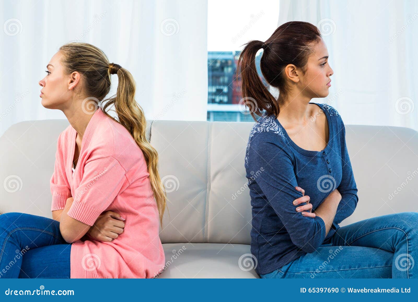 Friends sulking each other stock photo. Image of couch - 65397690