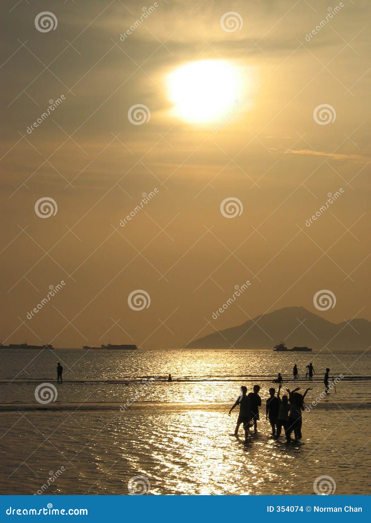 Friends on sunset beach stock photo. Image of people, golden - 354074