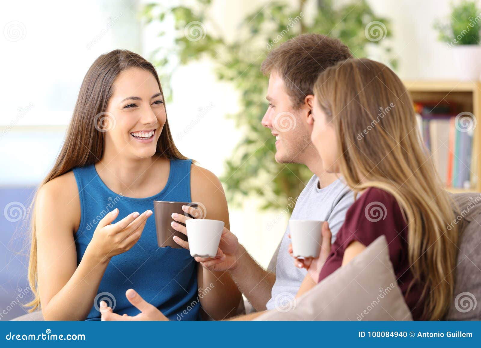 Friends Talking and Drinking Coffee at Home Stock Photo - Image of ...