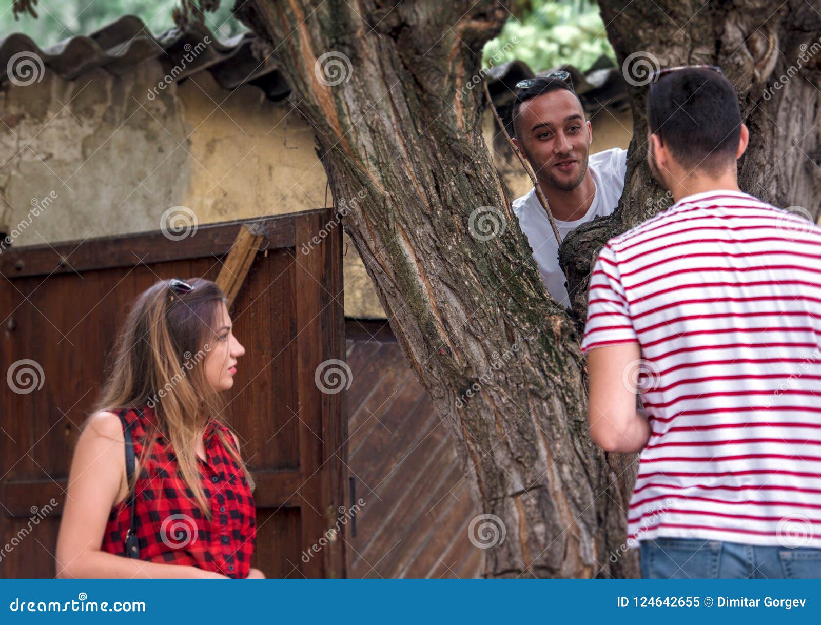Friends Talking in Front of a Tree Stock Image - Image of lifestyle ...