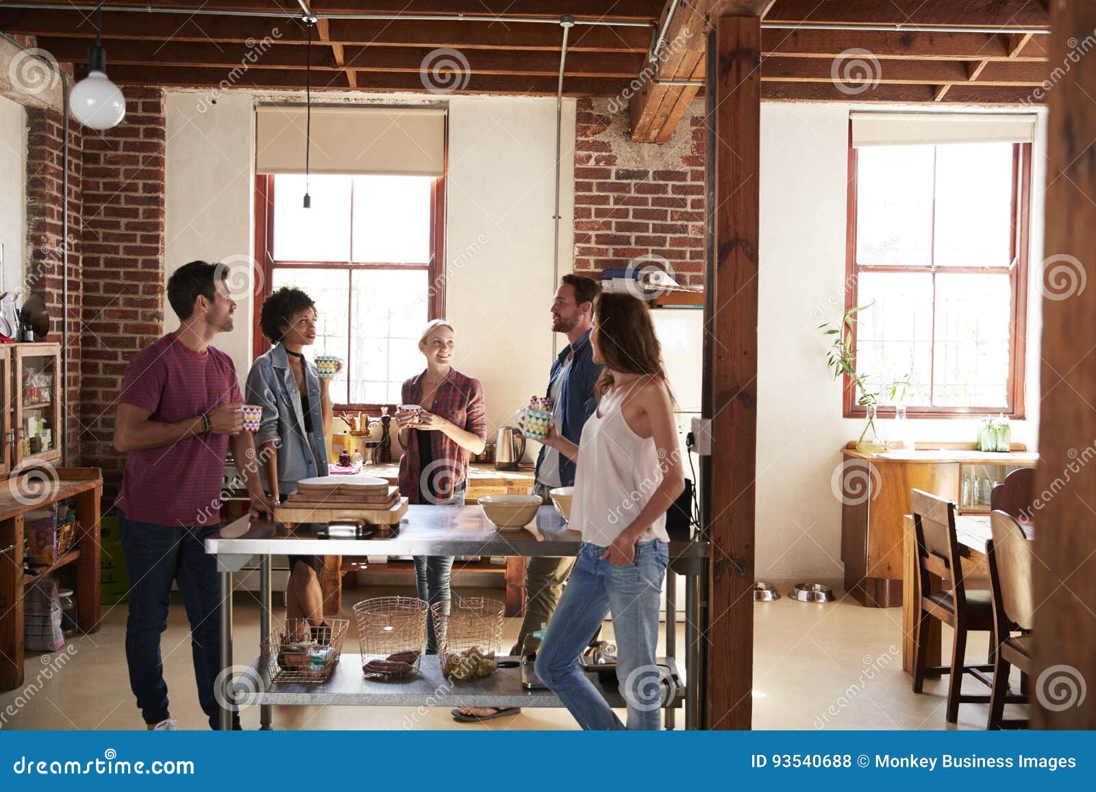 Friends Talking Over Coffee in Kitchen, Three Quarter Length Stock ...