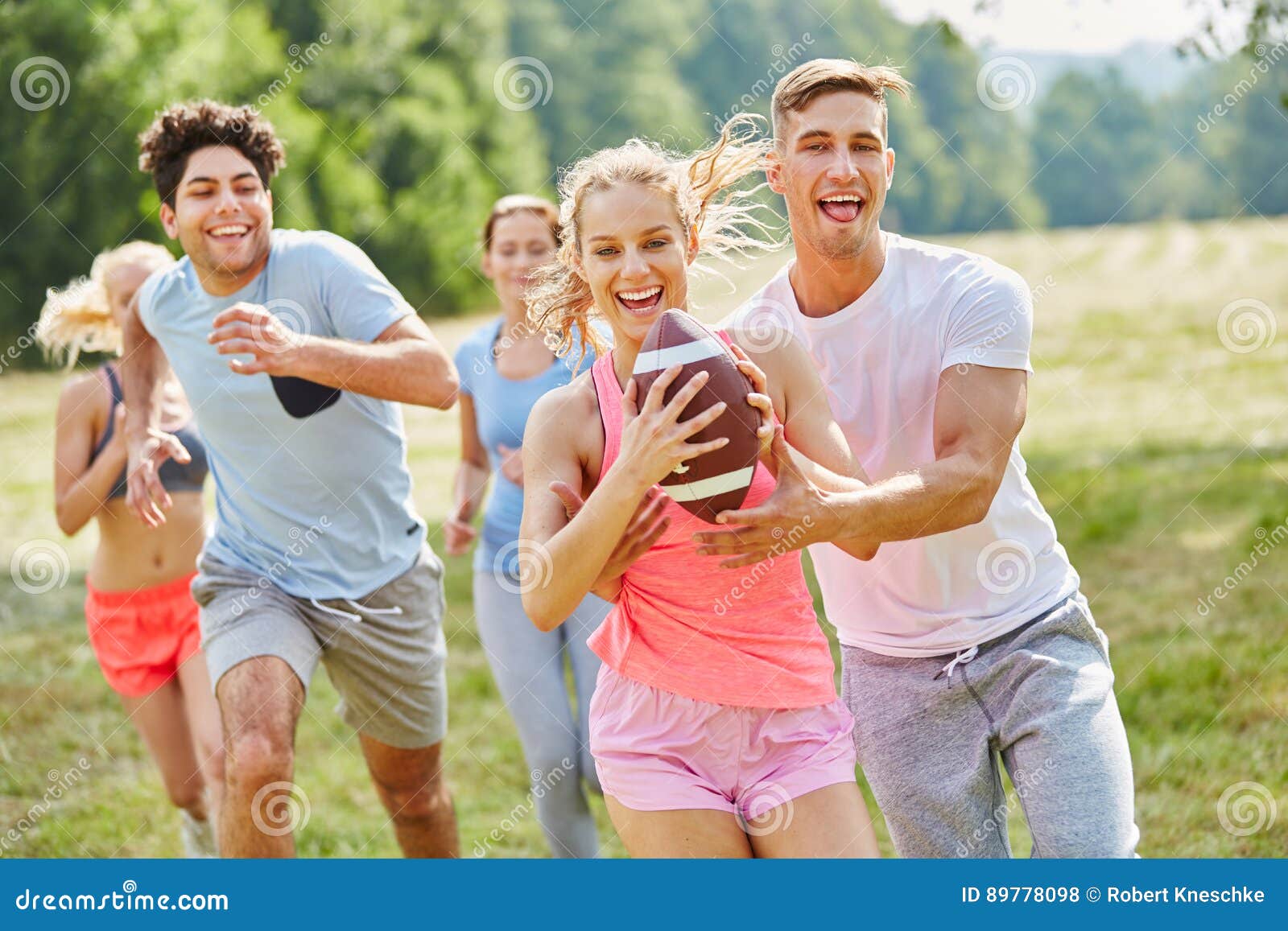Friends in Team Playing Rugby Stock Photo - Image of teenager, moving ...