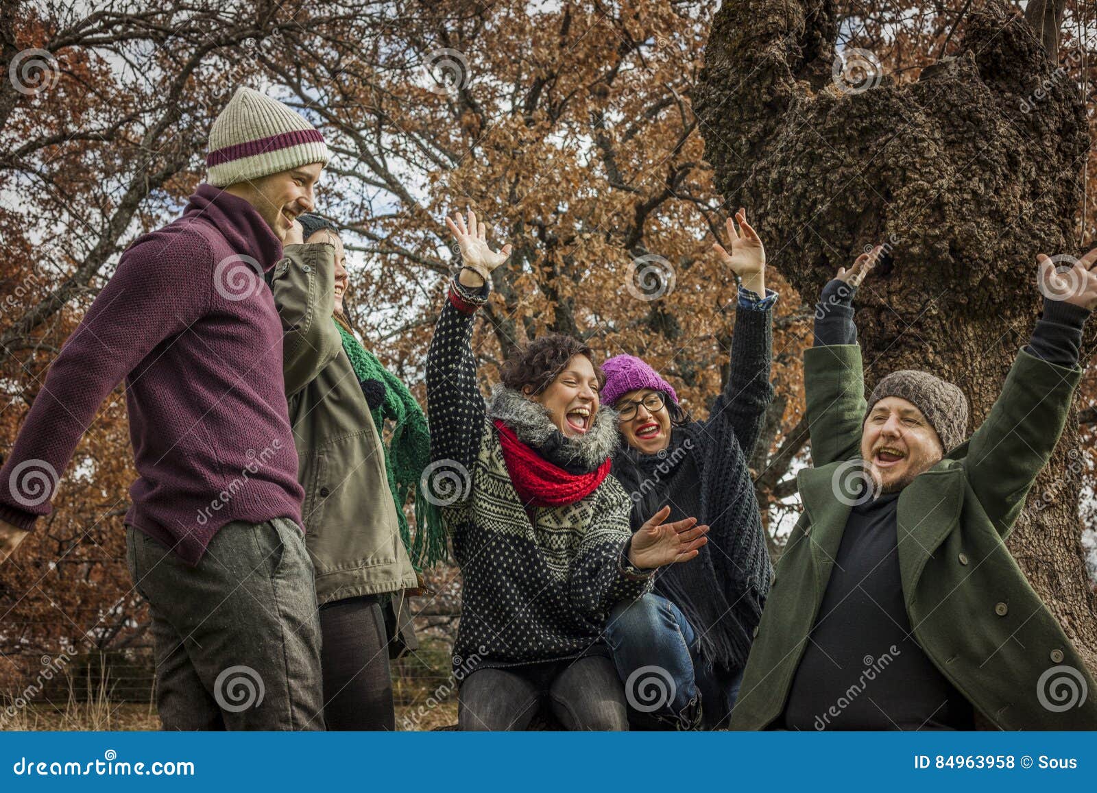 Friends Teamwork Celebrating Victory at the Park Stock Photo - Image of ...