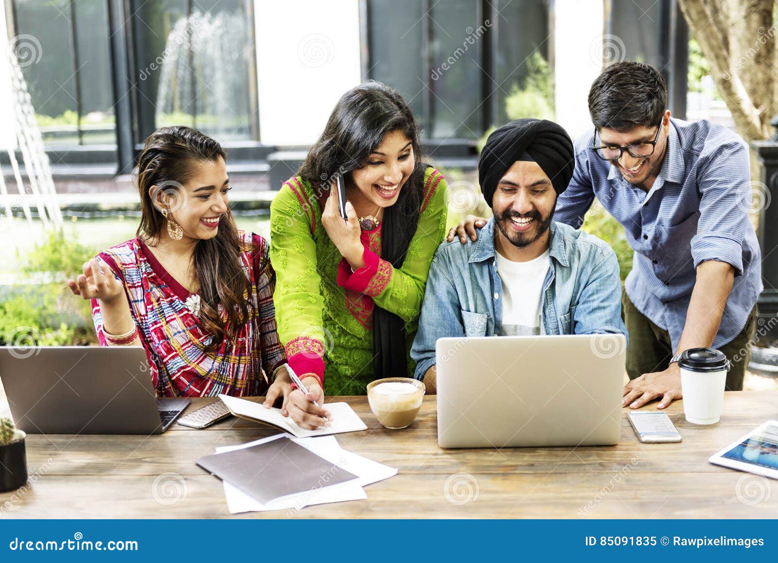 Friends Technology Devices Smiling Indoors Concept Stock Image - Image ...