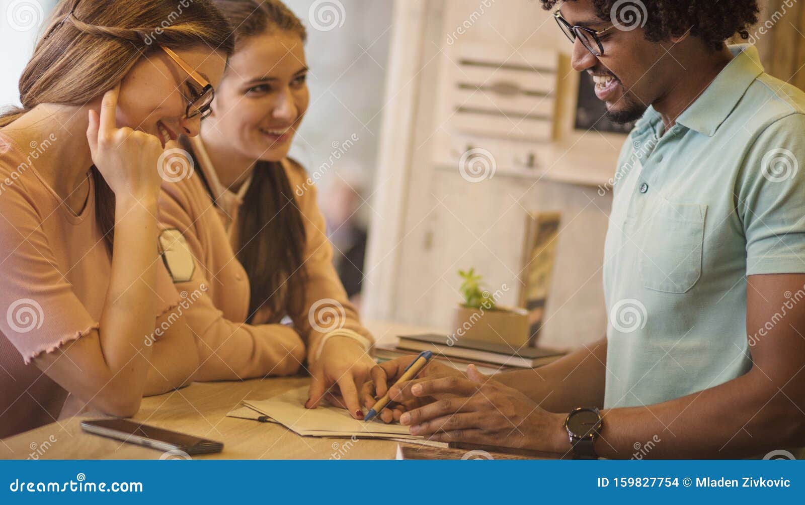 Friends are there to help stock photo. Image of indoors - 159827754
