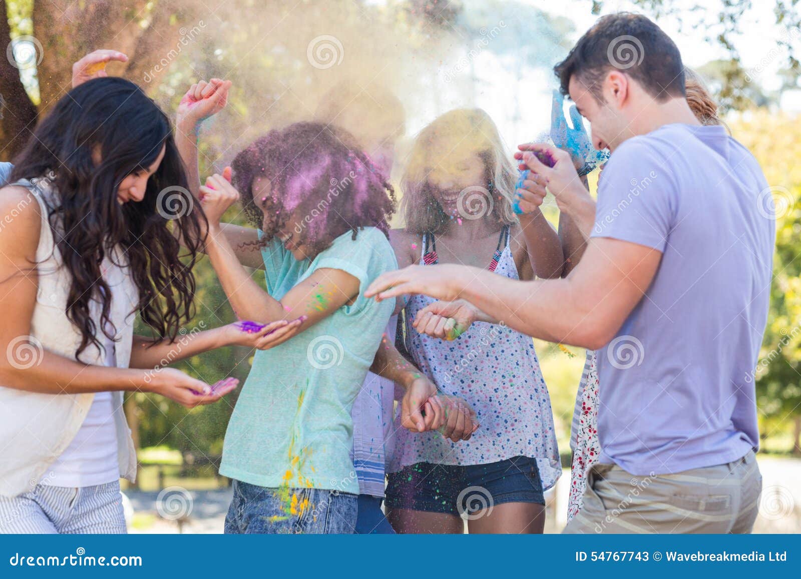 Friends Throwing Powder Paint Stock Image - Image of brunette, green ...