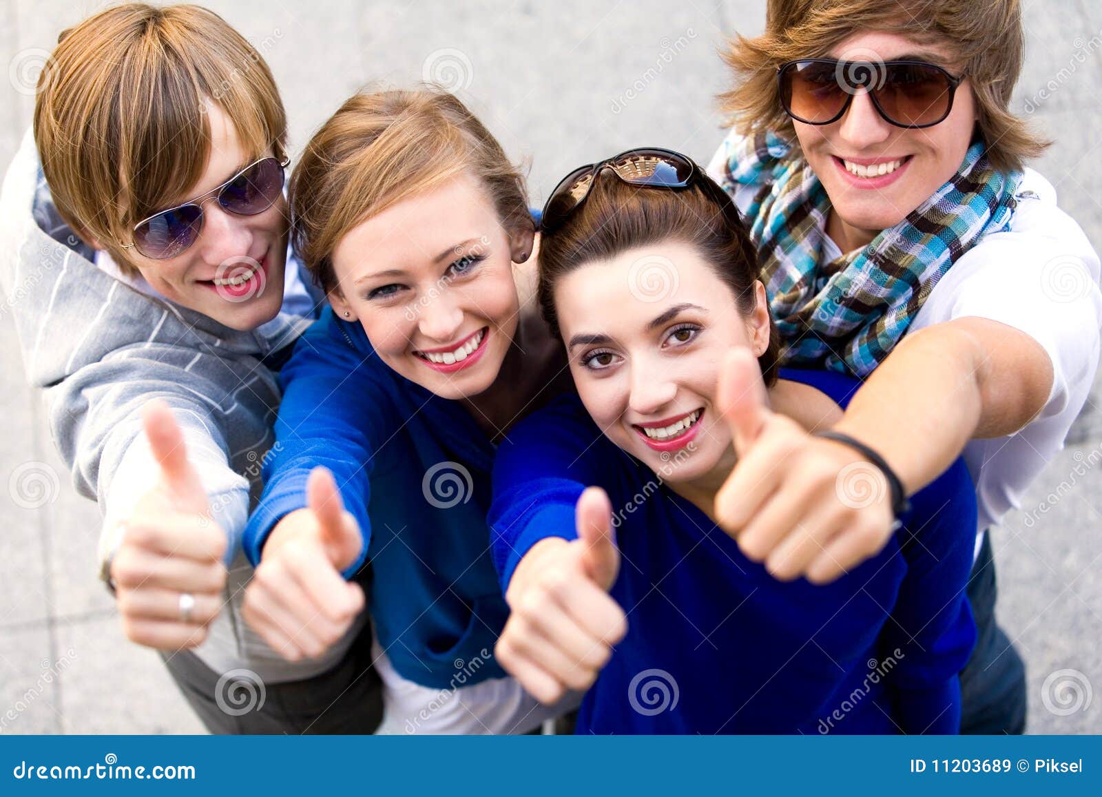 Friends with thumbs up stock image. Image of embracing - 11203689