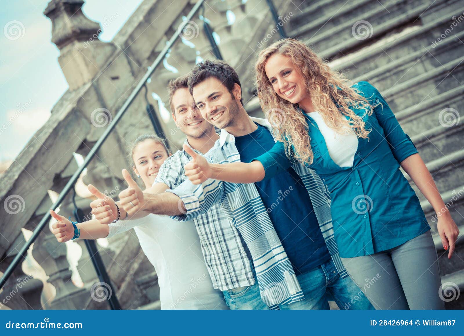 Friends with Thumbs Up stock photo. Image of student - 28426964