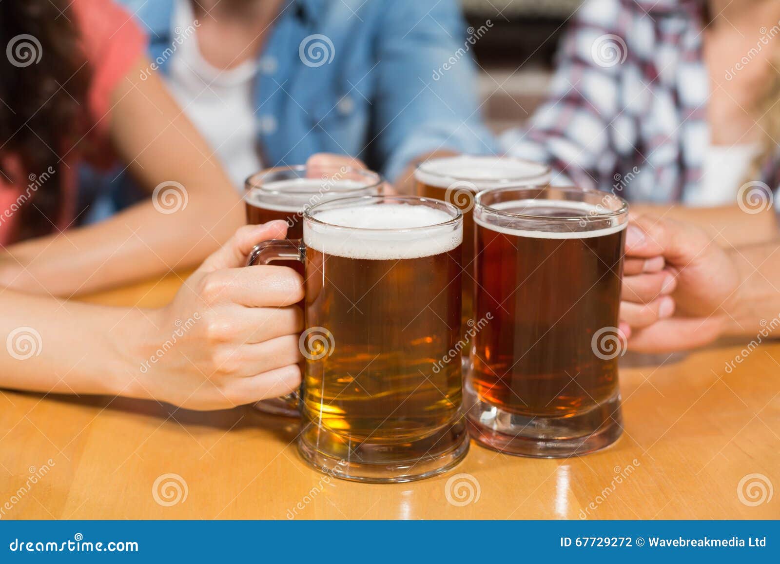 Friends Toasting with Beers Stock Photo - Image of woman, industry ...
