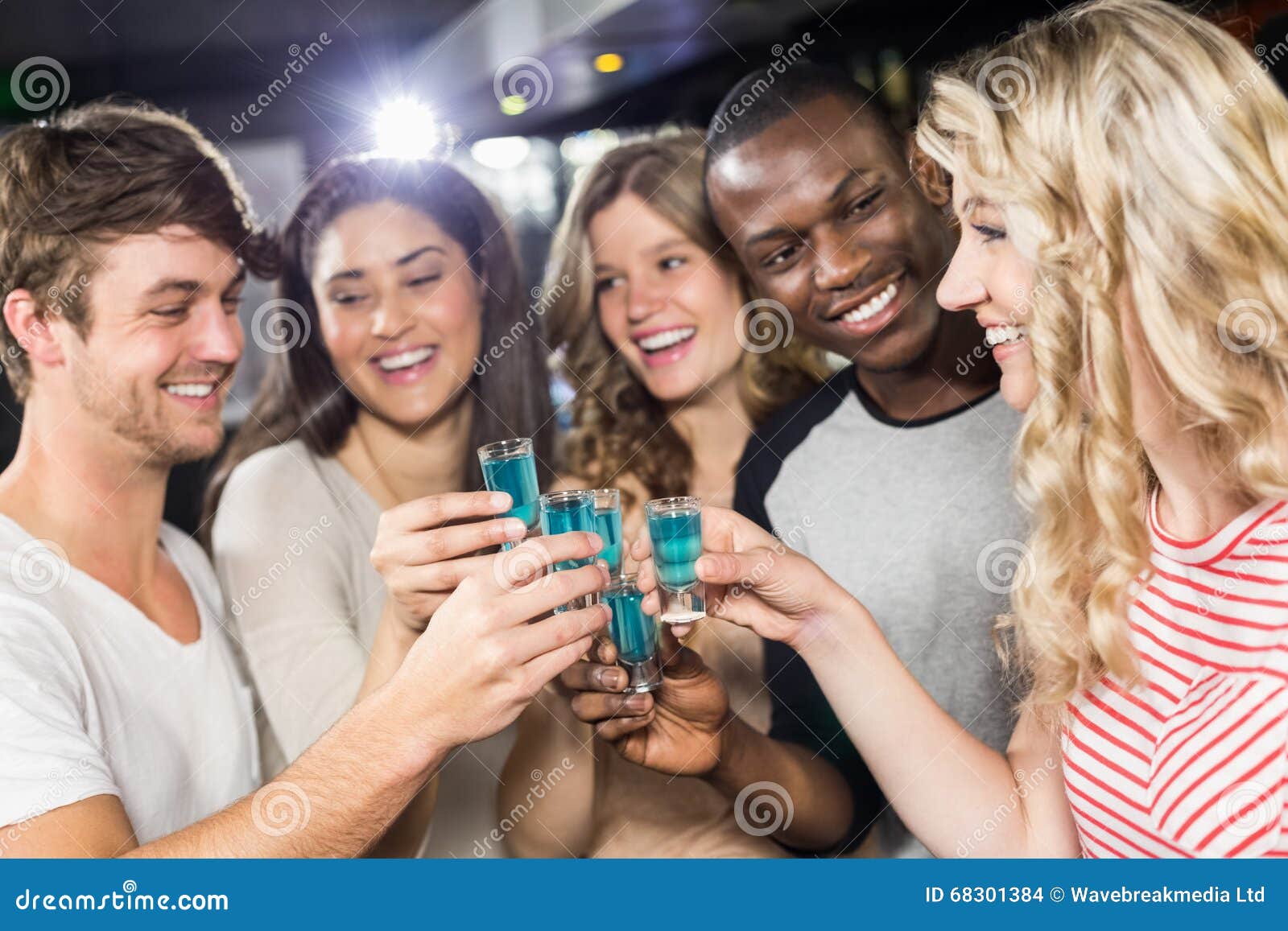 Friends Toasting with Shots Stock Photo - Image of clubbing ...
