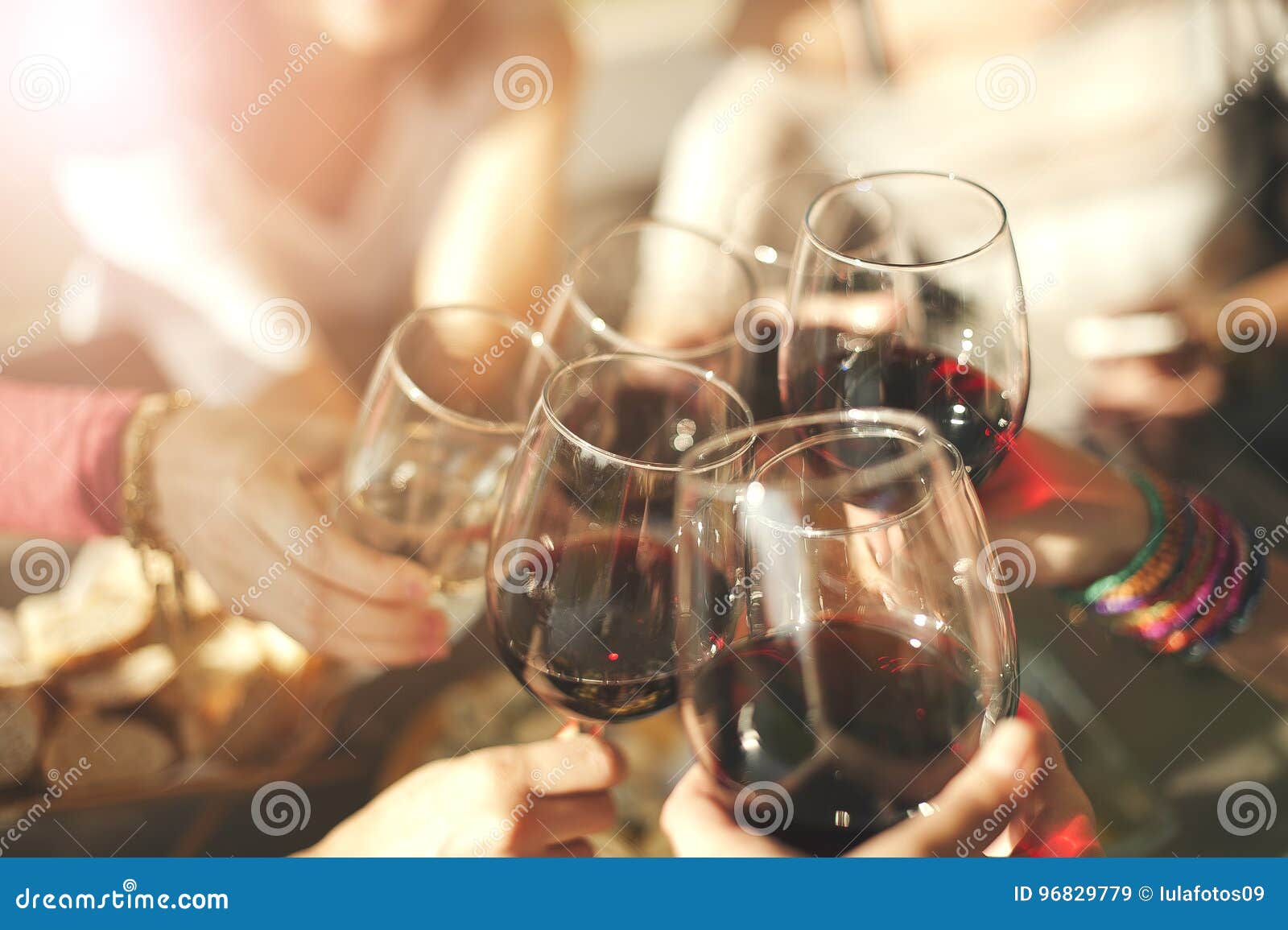 Friends toasting with wine stock image. Image of toast - 96829779