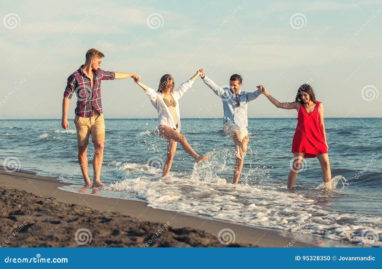 Friends Together on the Beach Having Fun. Stock Photo - Image of ...