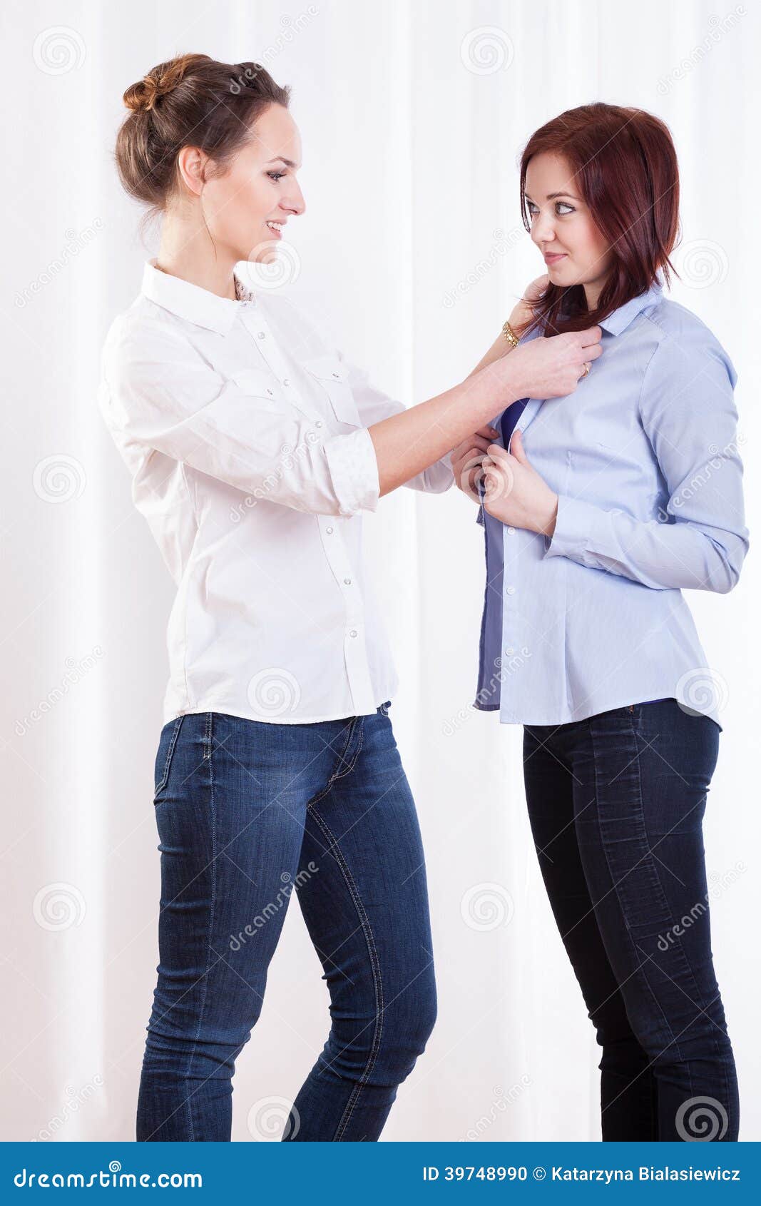 Friends trying on shirt stock photo. Image of meeting - 39748990