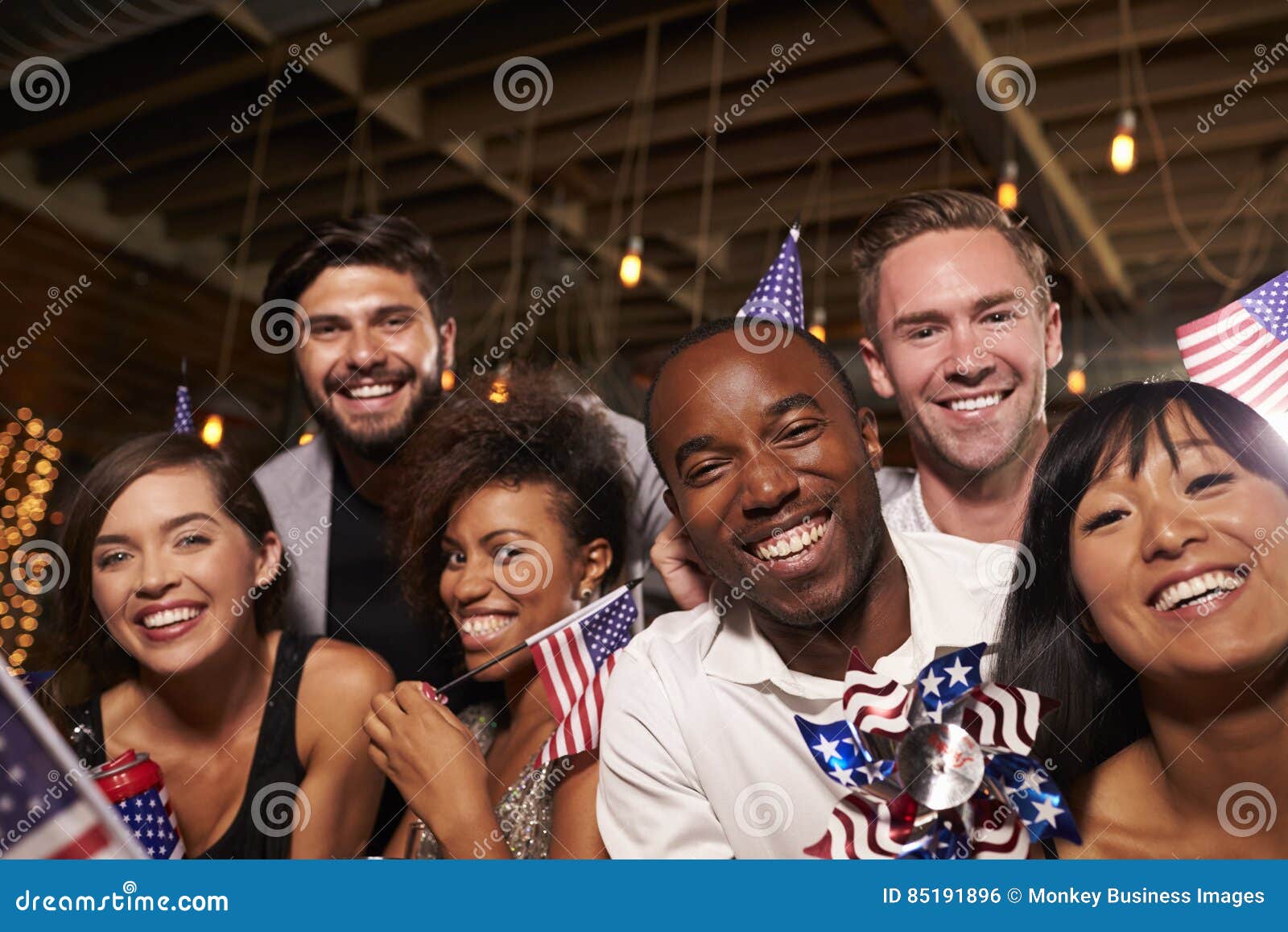 Friends with US Flags at a 4th July Party in a Bar, Close Up Stock ...
