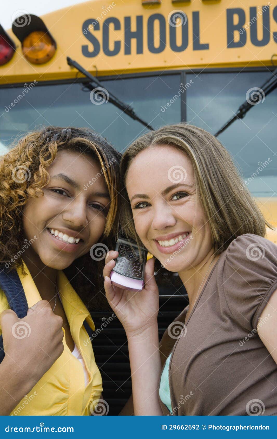 Friends Using Cell Phone School Bus Stock Photos - Free & Royalty-Free ...