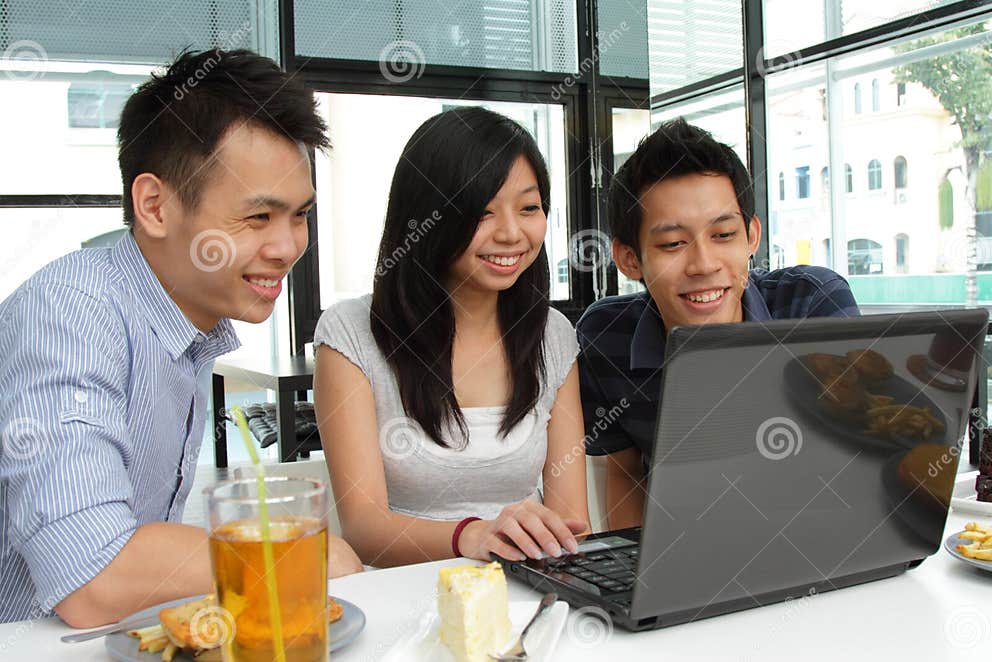 Friends using a laptop stock photo. Image of food, friends - 33413208