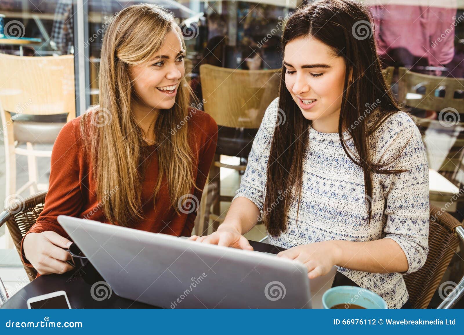 Friends Using Laptop Together Stock Photo - Image of computer, happy ...