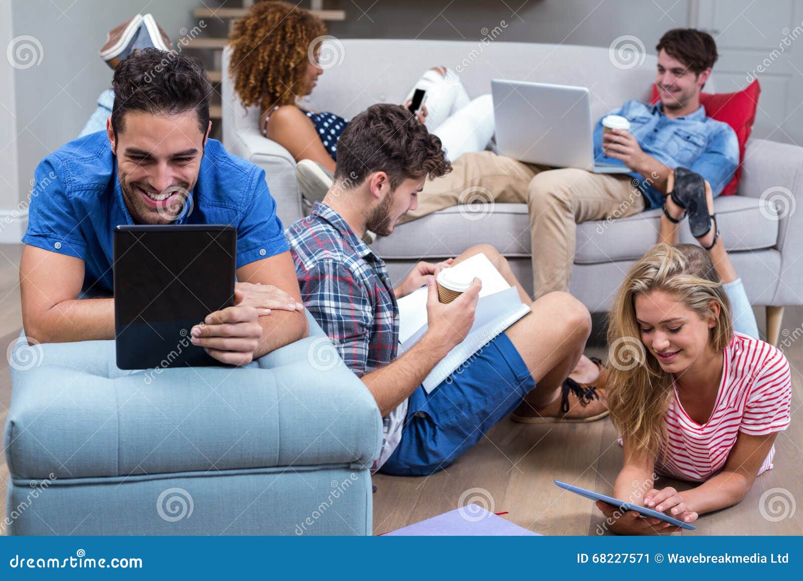 Friends Using Modern Technologies in Living Room Stock Image - Image of ...