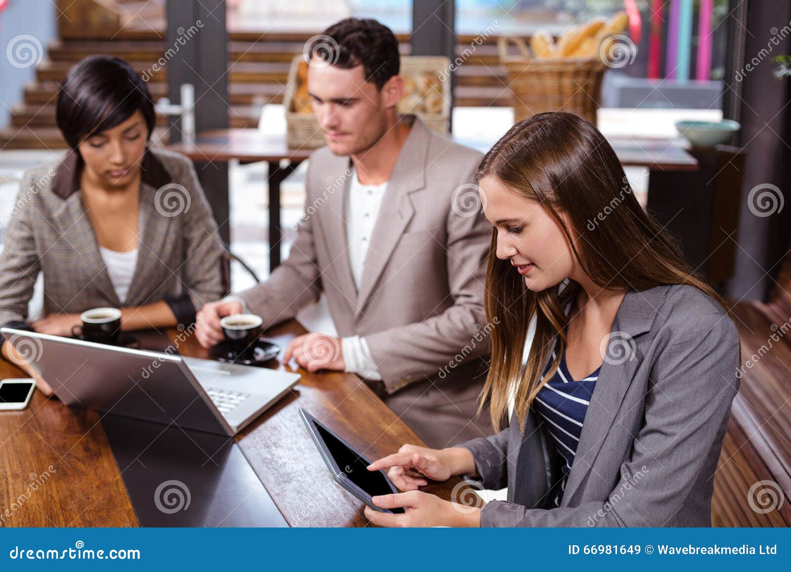 Friends using technology stock image. Image of concentrating - 66981649