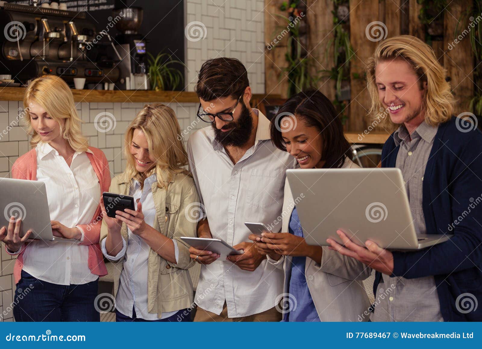 Friends using technology stock image. Image of fashion - 77689467
