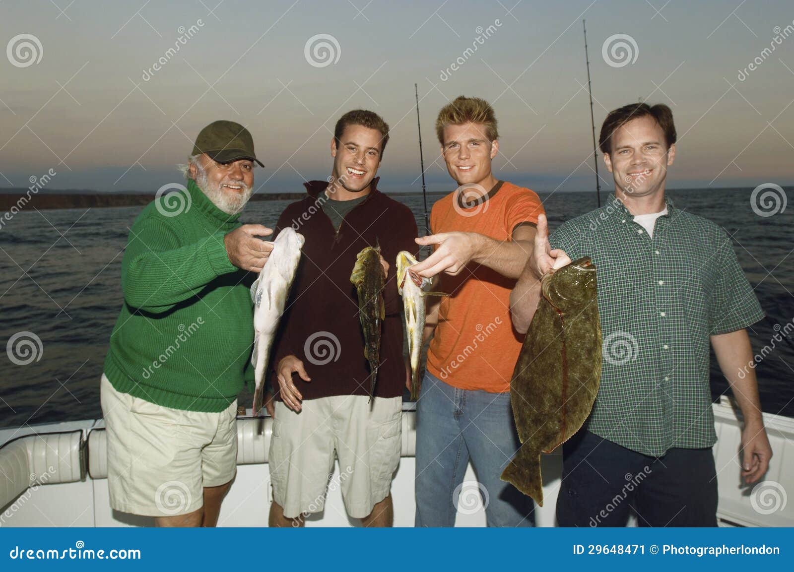 Friends with Variety of Catch on Yacht Stock Image - Image of ethnicity ...