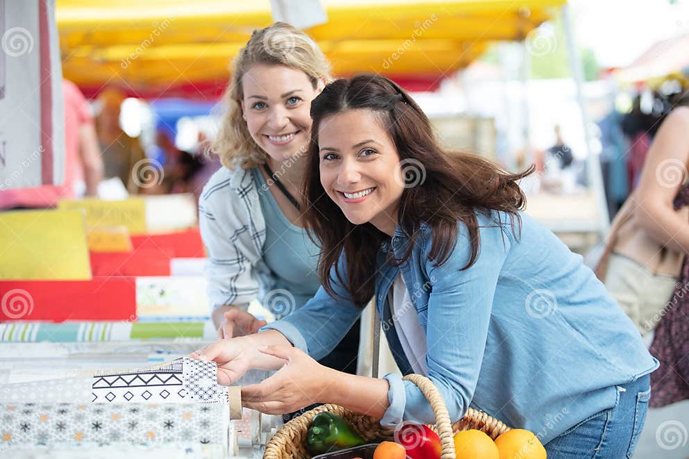 Friends visiting at market stock photo. Image of enjoying - 288846128