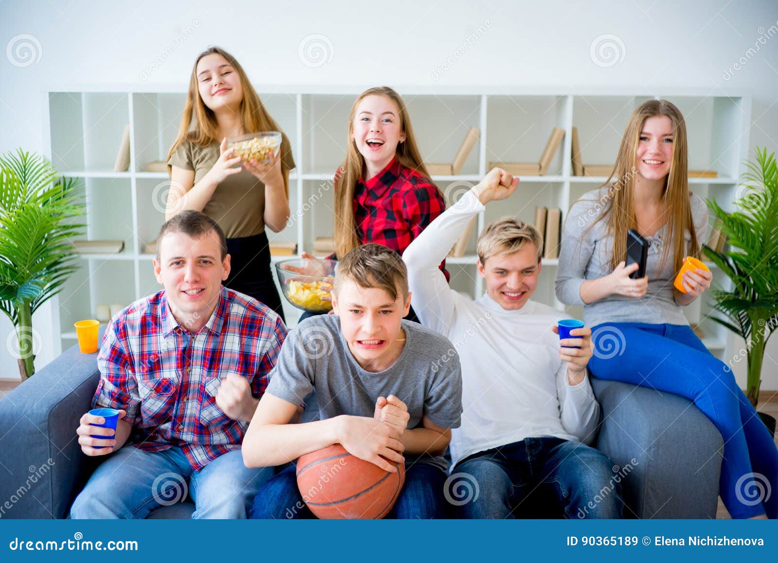 Friends Watching Basketball Stock Image - Image of weekend, smiling ...