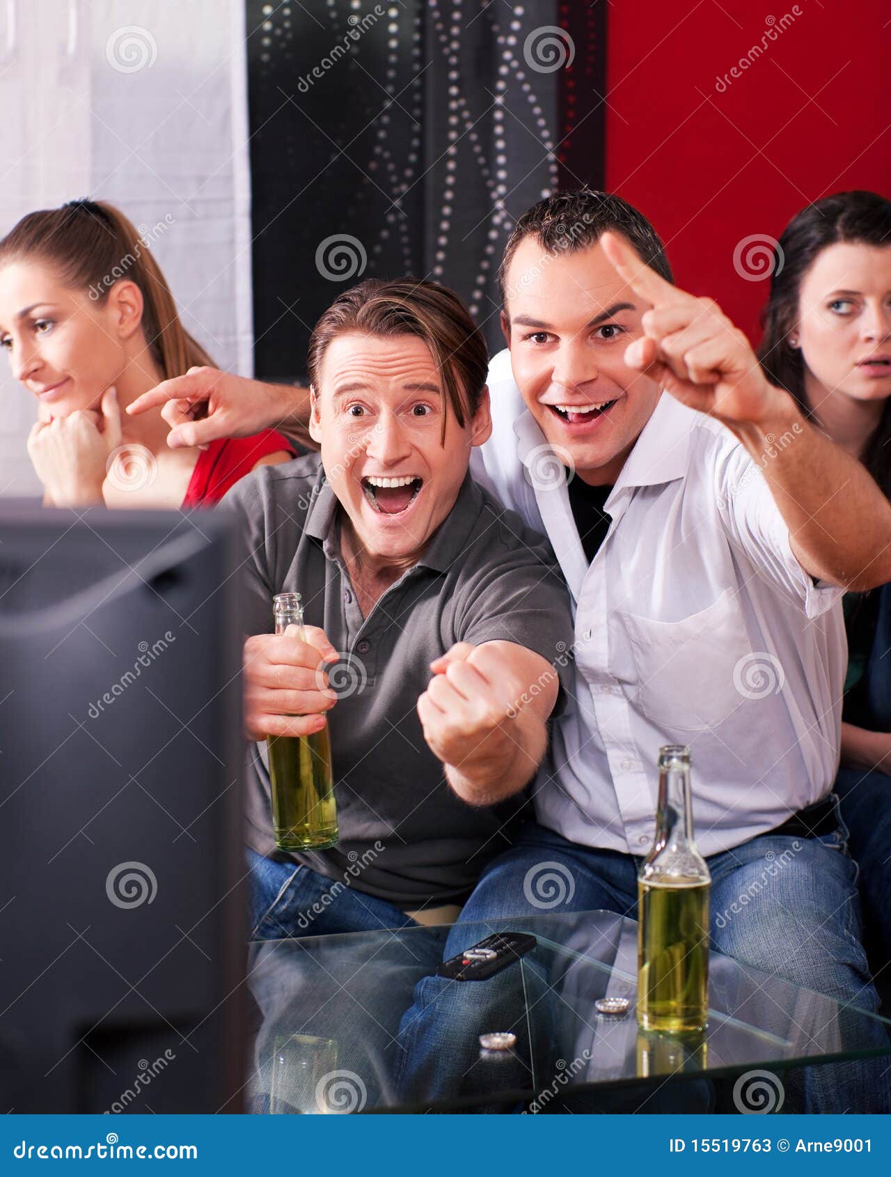 Friends Watching Exciting Game at TV Stock Image - Image of table ...