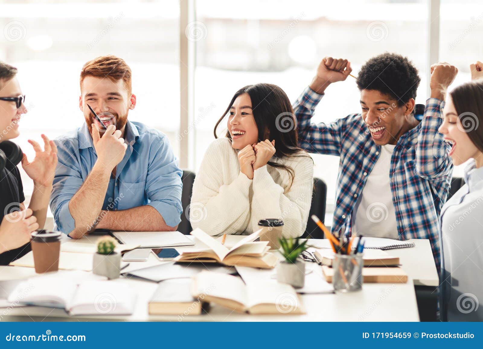 Friendship Concept. Happy Classmates Talking in College Library Stock ...