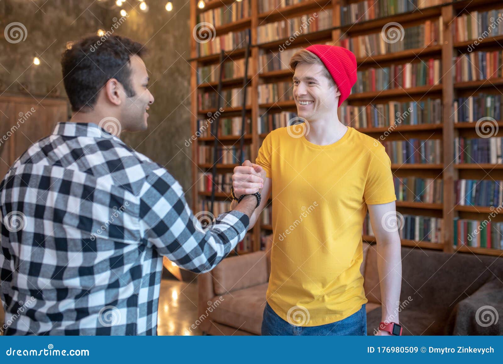 Two Young Handsome Men Holding Each Others Hands Stock Image - Image of ...