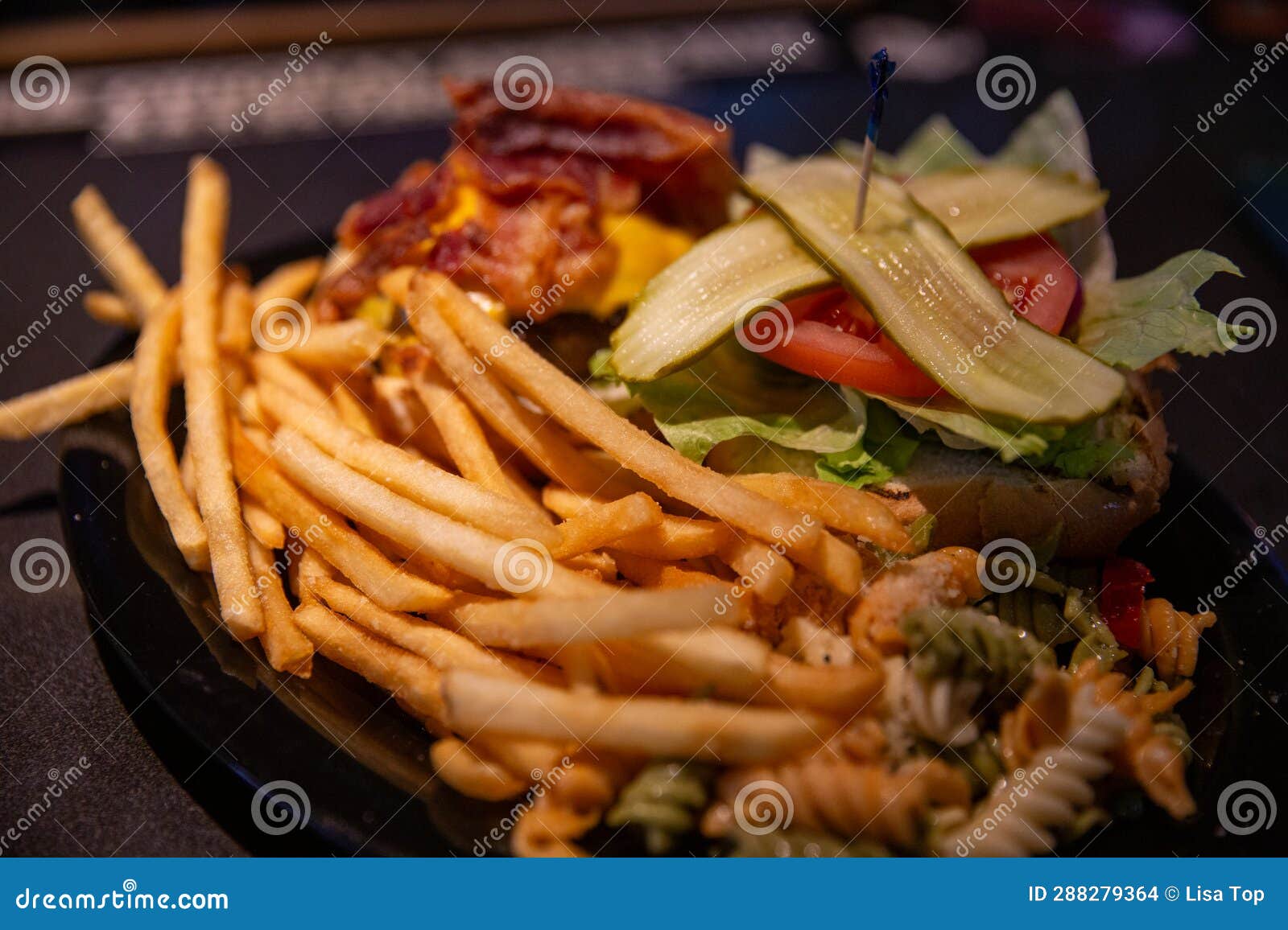 Fries with a burger stock photo. Image of casual, delicious - 288279364