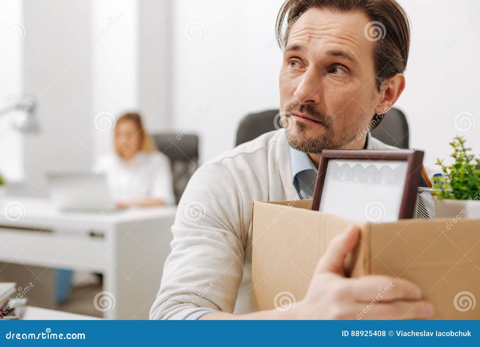 Frightened Fired Employee Holding the Box in the Office Stock Photo ...