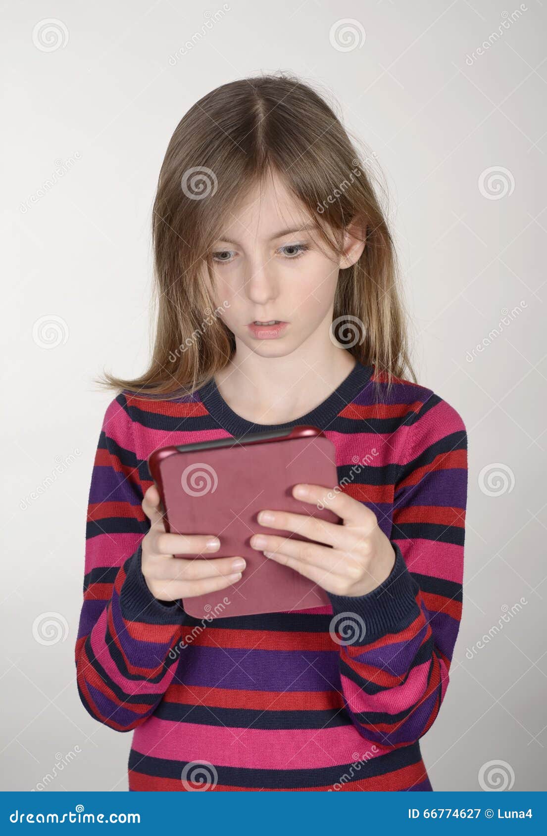 Frightened Girl with Digital Tablet Stock Image - Image of child, fear ...
