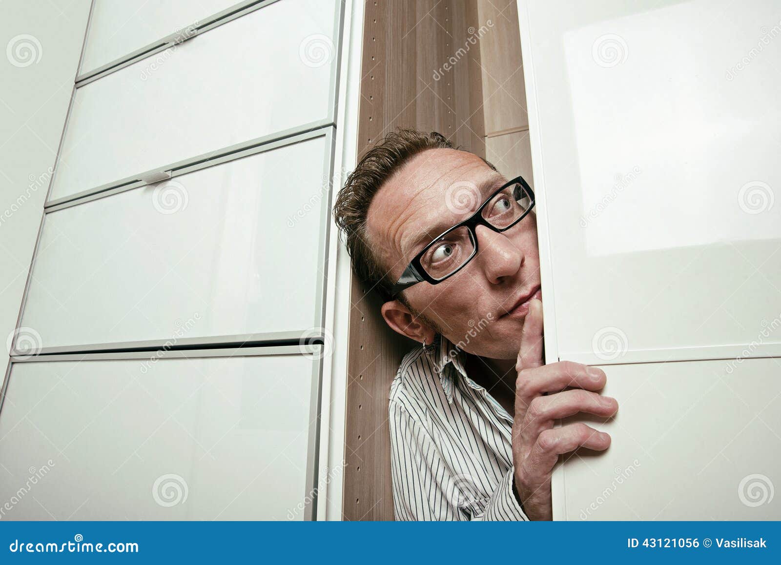 Frightened Man Peep Out White Wardrobe. Stock Photo - Image of pending ...