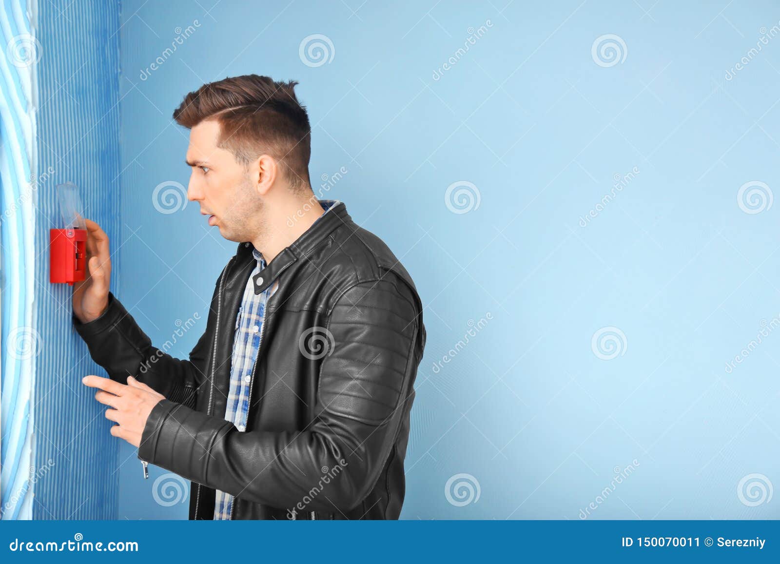 Frightened Man Using Fire Alarm System Indoors Stock Image - Image of ...