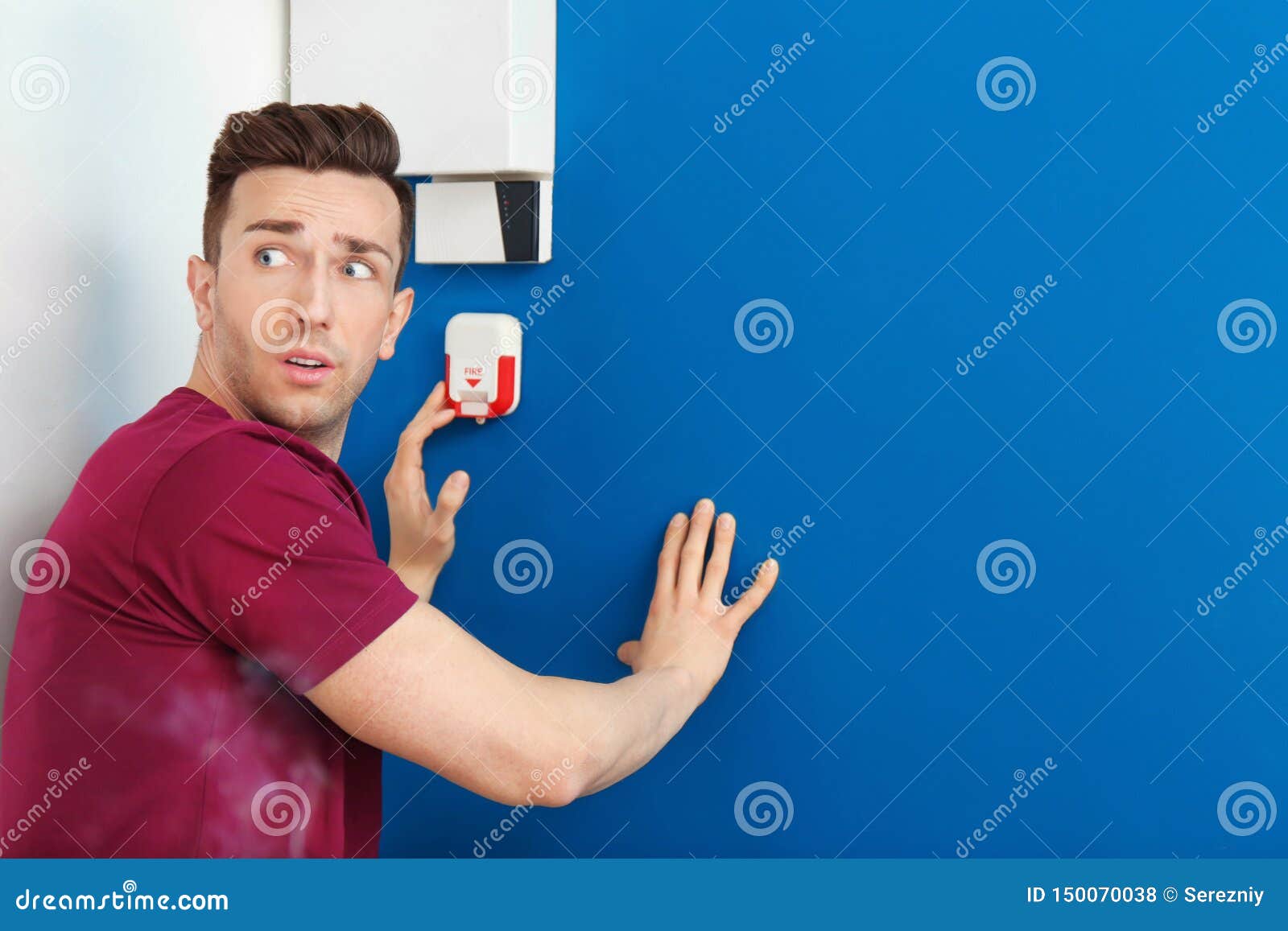 Frightened Man Using Fire Alarm System Indoors Stock Photo - Image of ...