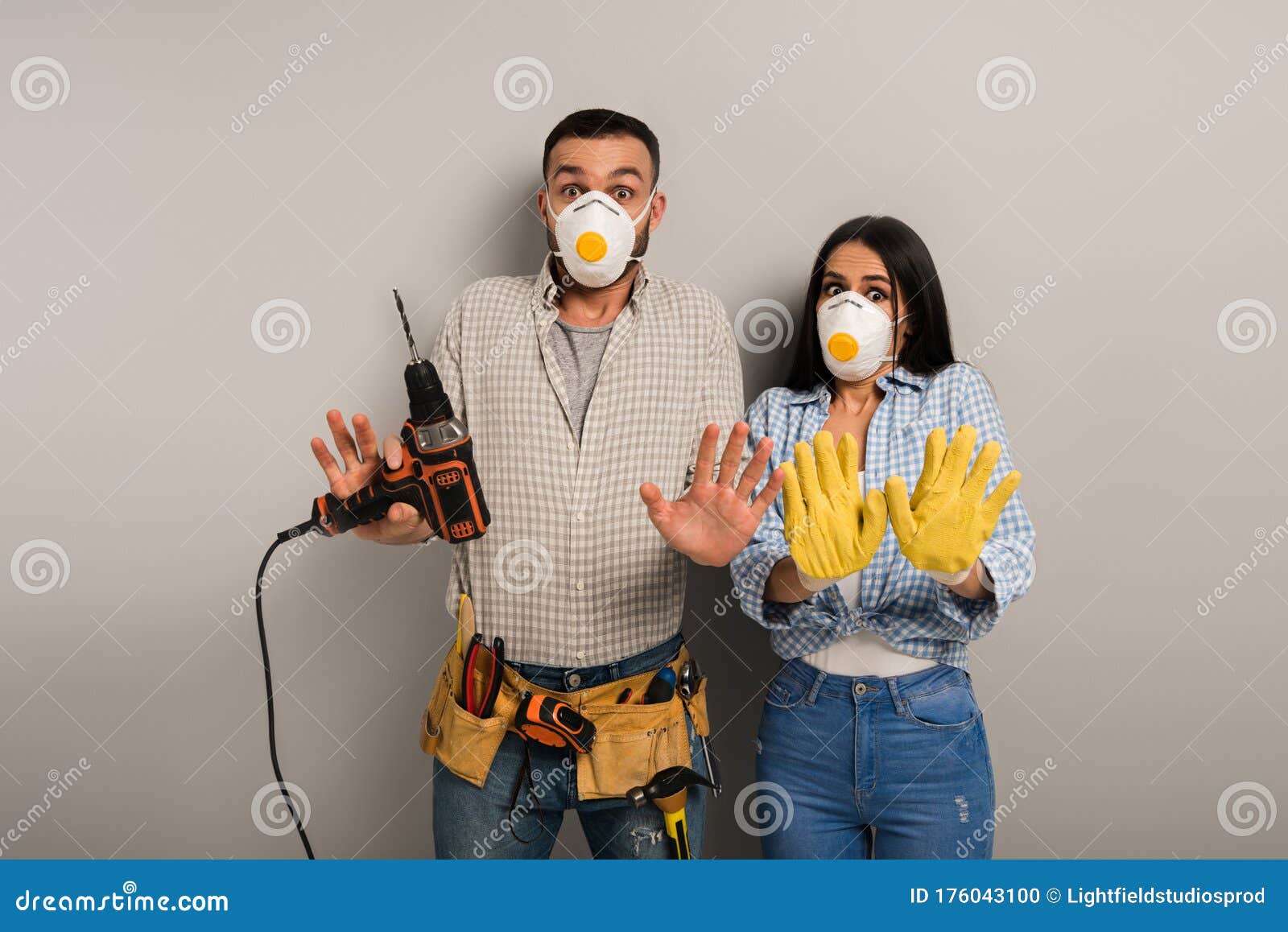 Manual Workers in Safety Masks Holding Stock Photo - Image of workers ...