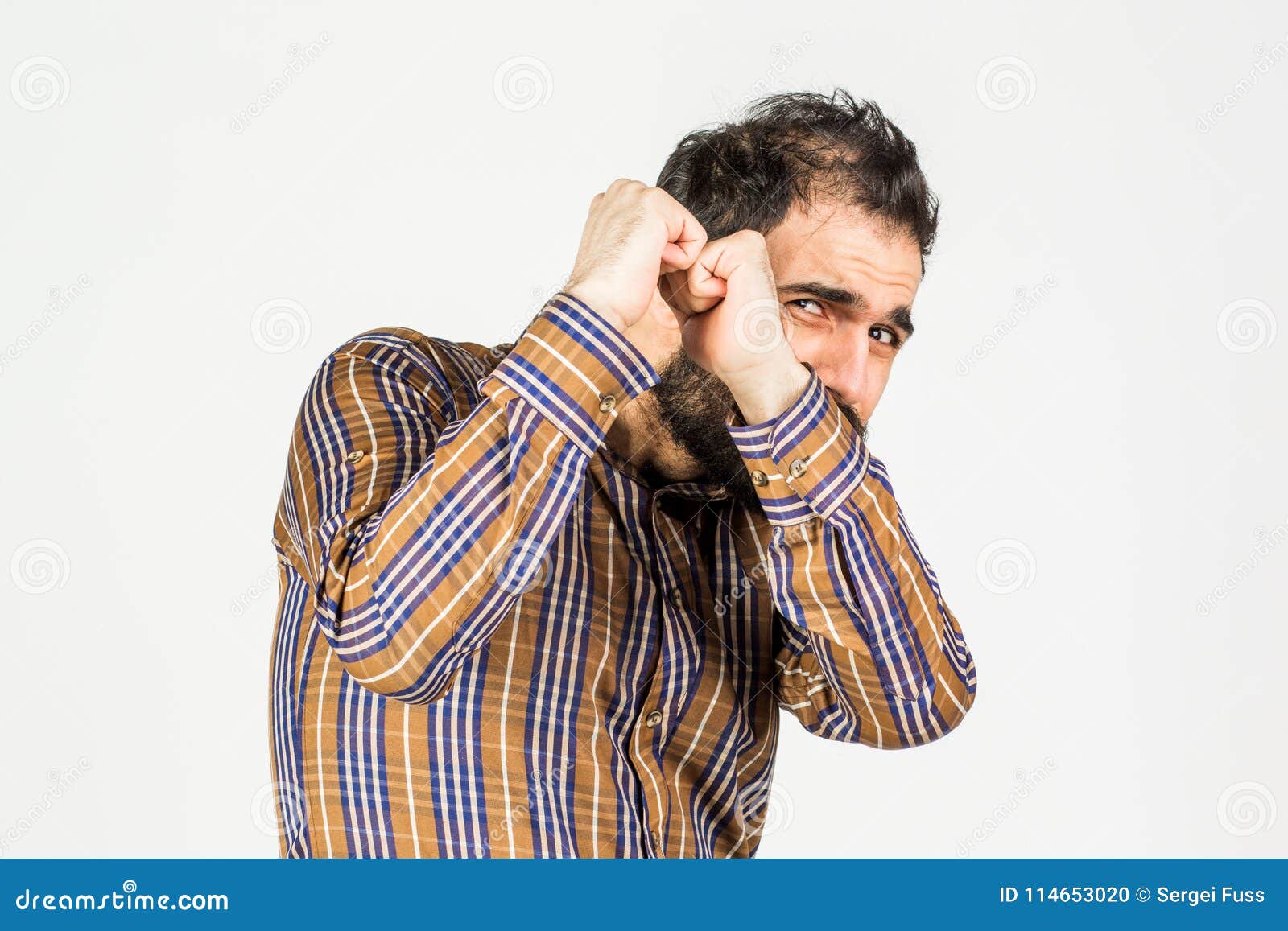 A Frightened Young Man with a Worried Expression on His Face Stock ...