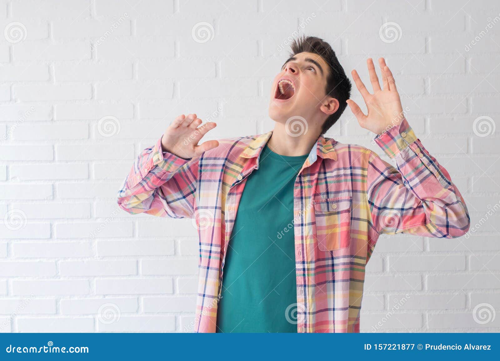 Frightened Young or Teen Looking Up Stock Image - Image of hands, fall ...