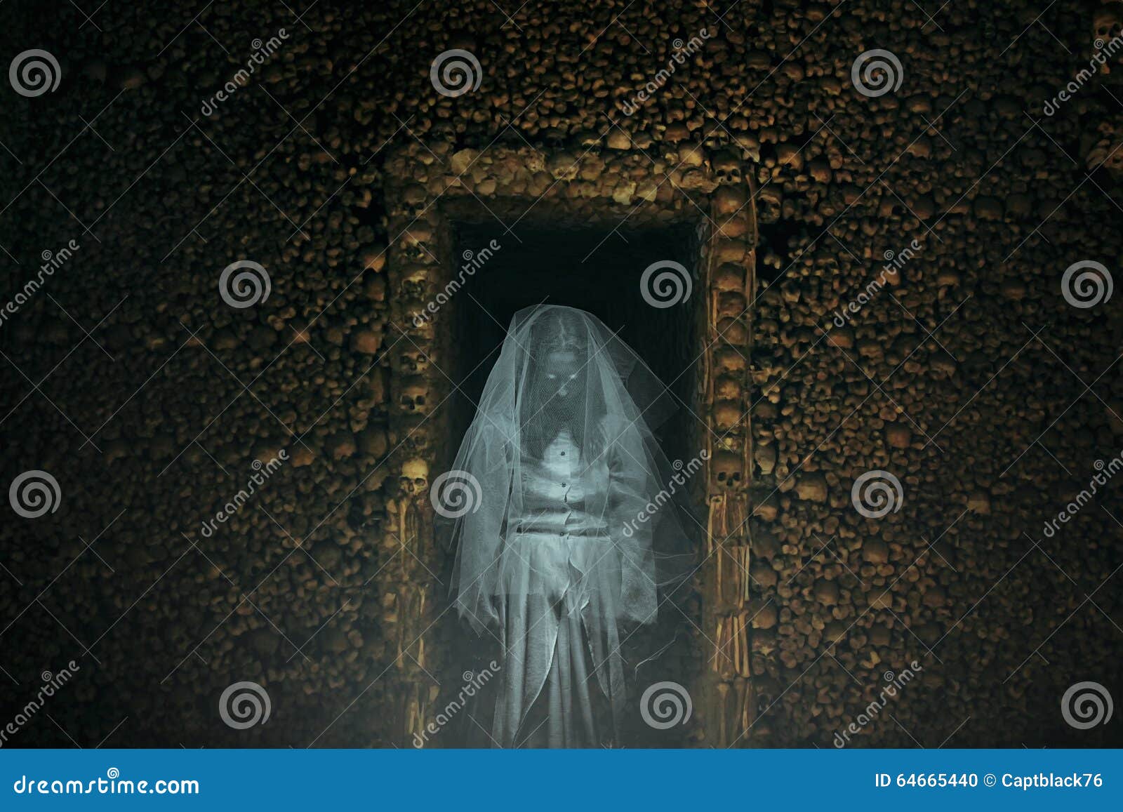 Frightening Ghost in a Catacomb Full of Bones Stock Photo - Image of ...
