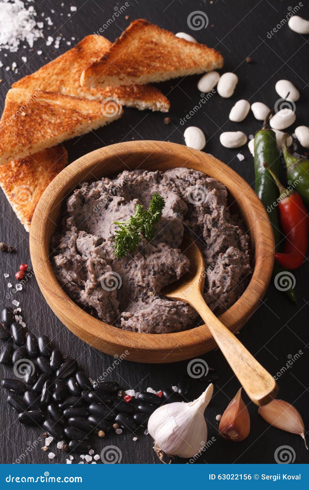 Frijoles Refritos with Ingredients Close-up. Vertical Stock Photo ...