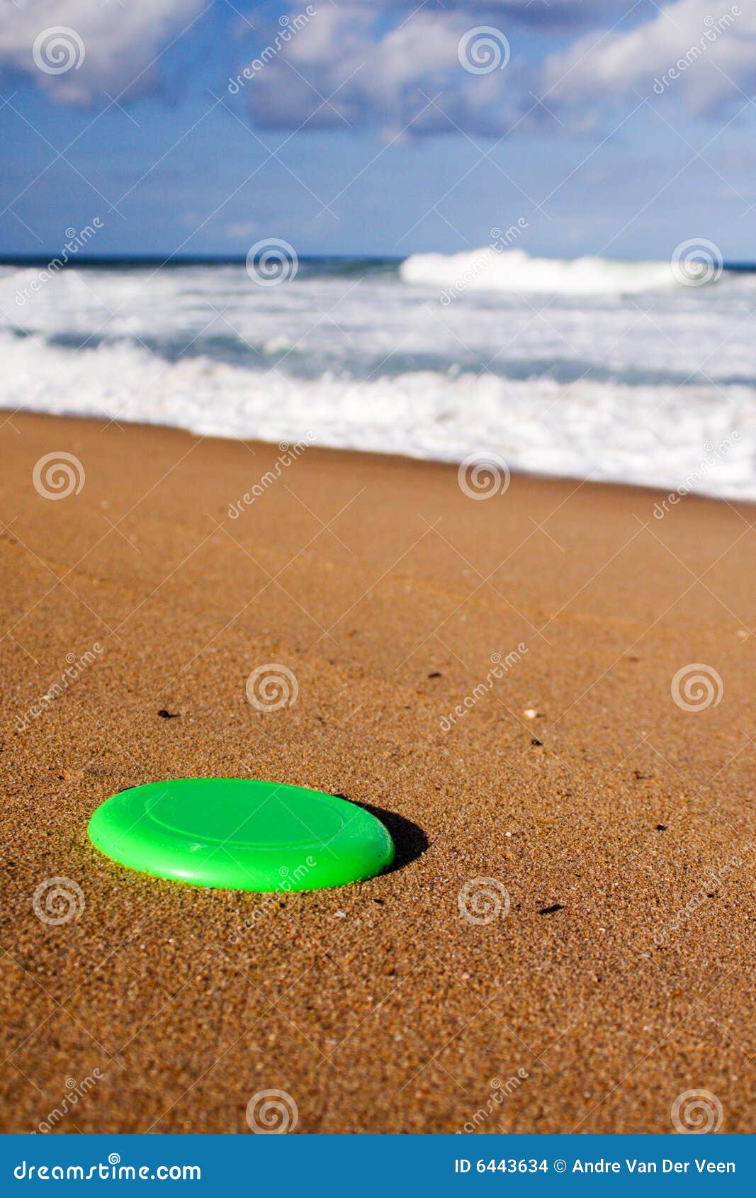 A Frisbee on the Beach Sand Stock Photo - Image of light, vacation: 6443634