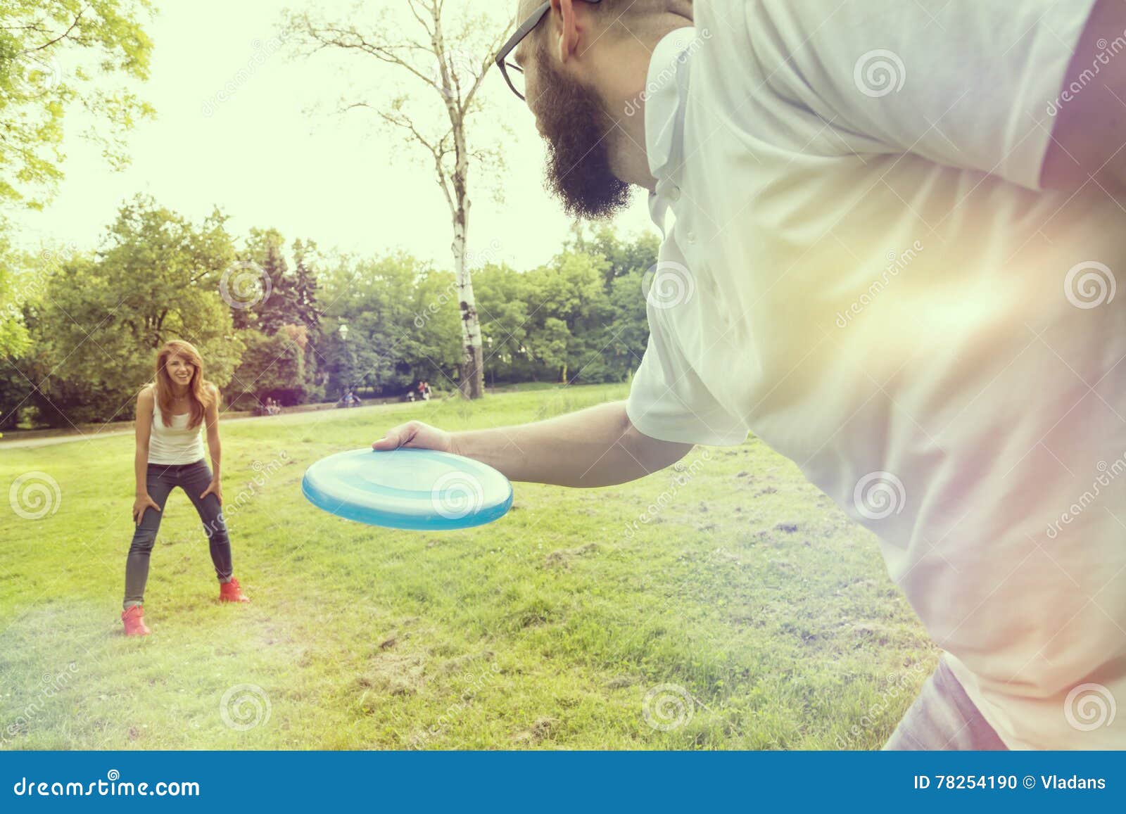 Frisbee throwing stock photo. Image of friends, boyfriend - 78254190