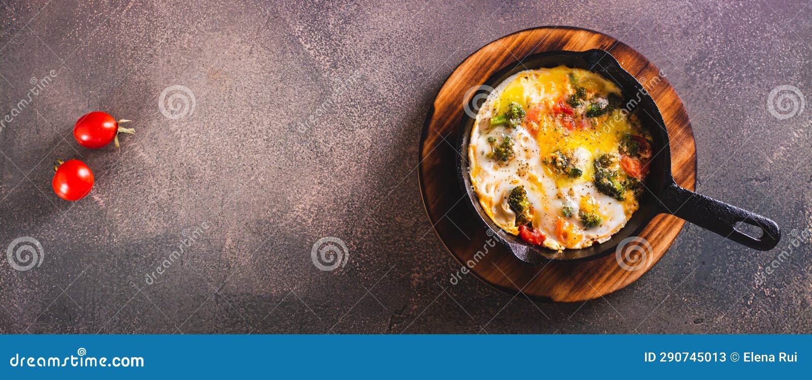 Frittata with Tomatoes and Broccoli in a Frying Pan on the Table Top ...