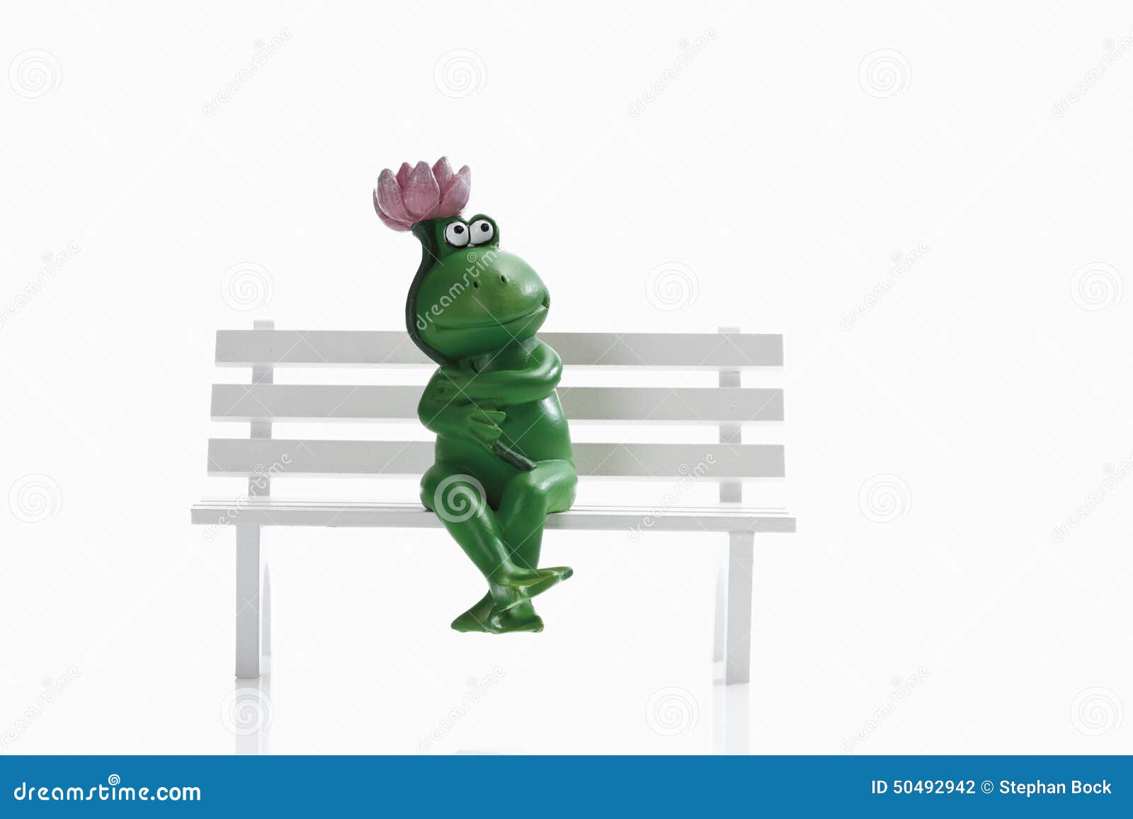 Frog Figurine Sitting on Bench Stock Photo - Image of relax, bench ...