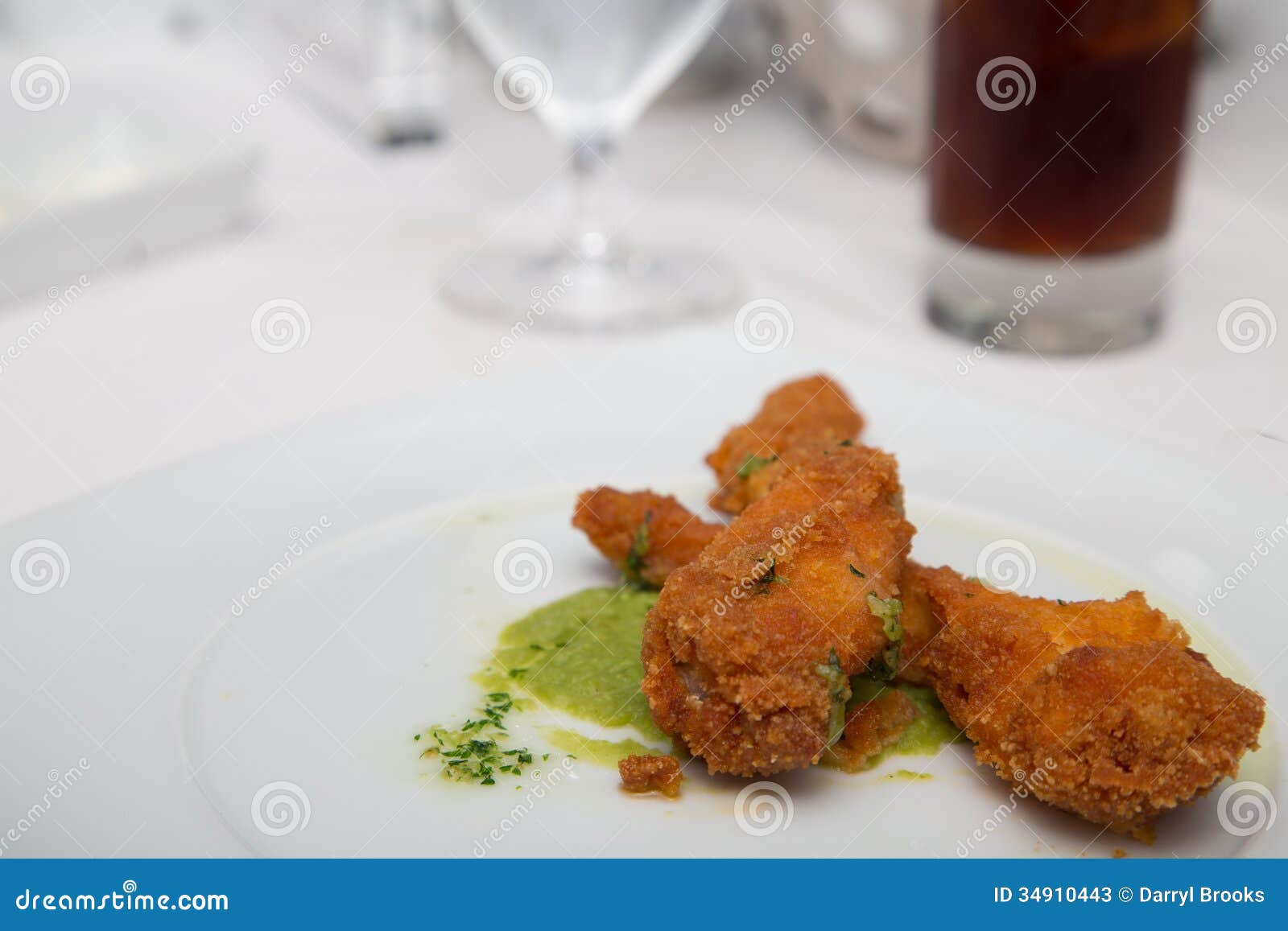Frog Legs on Formal Table stock image. Image of plate - 34910443