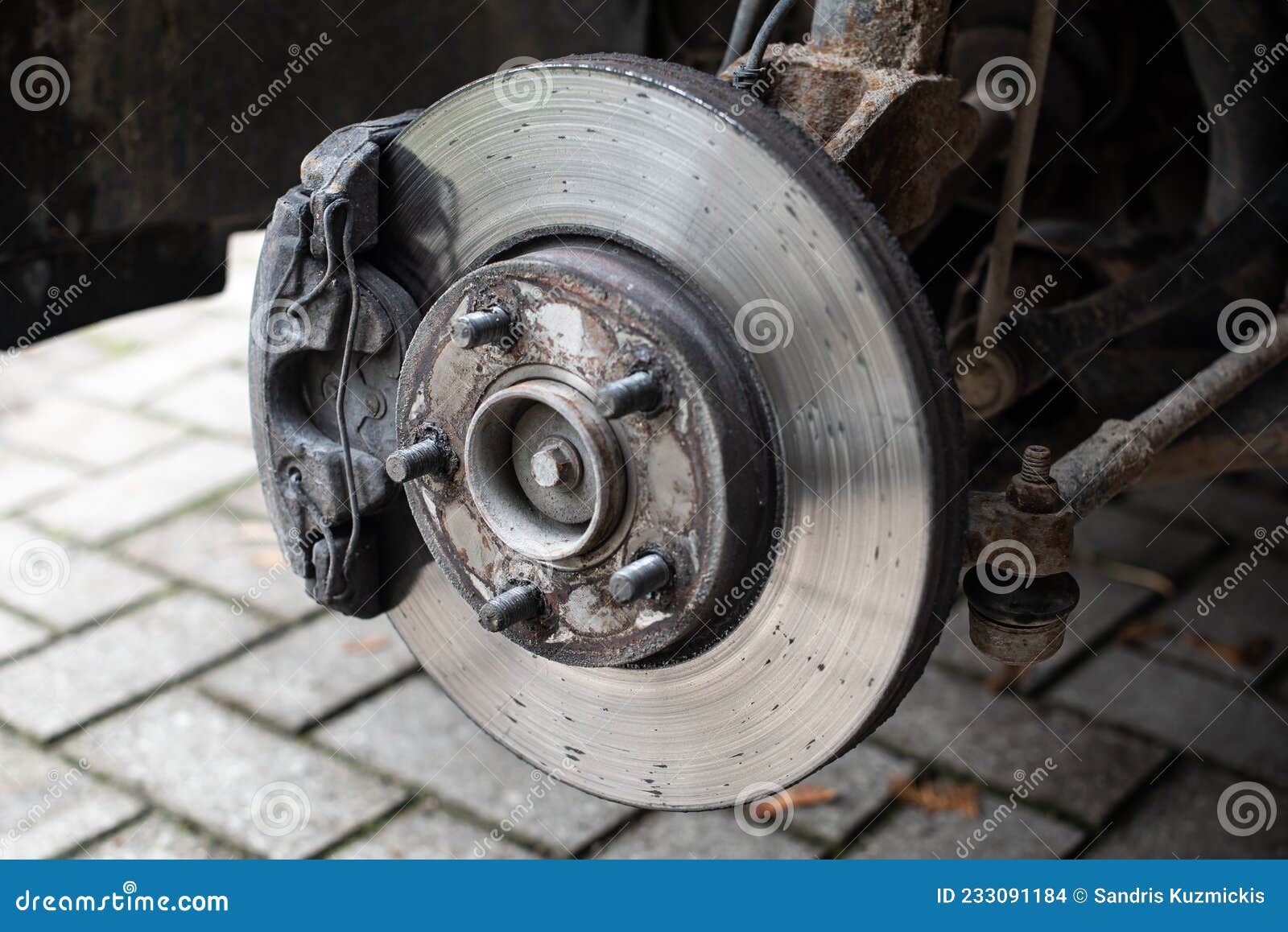 Front Assembly of Ventilated Disc Brake and Wheel Hub on an Used Car ...