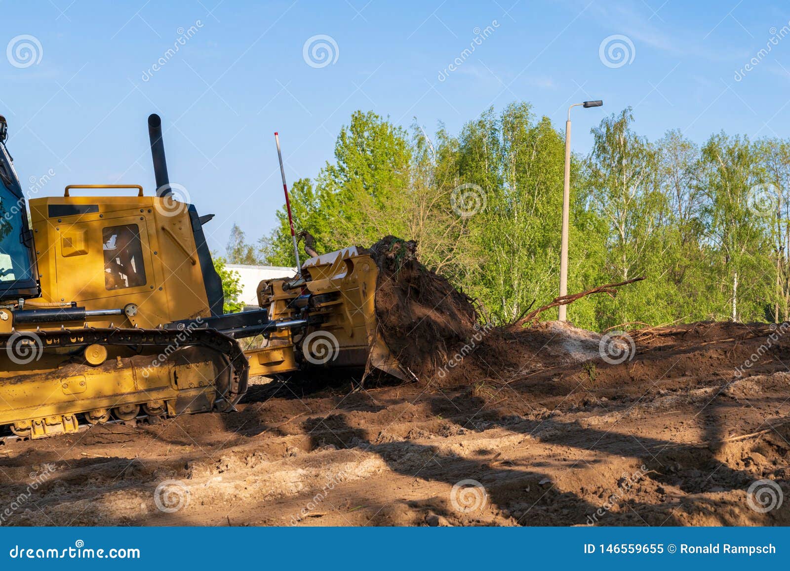 A bulldozer at work stock image. Image of clearing, topsoil - 146559655