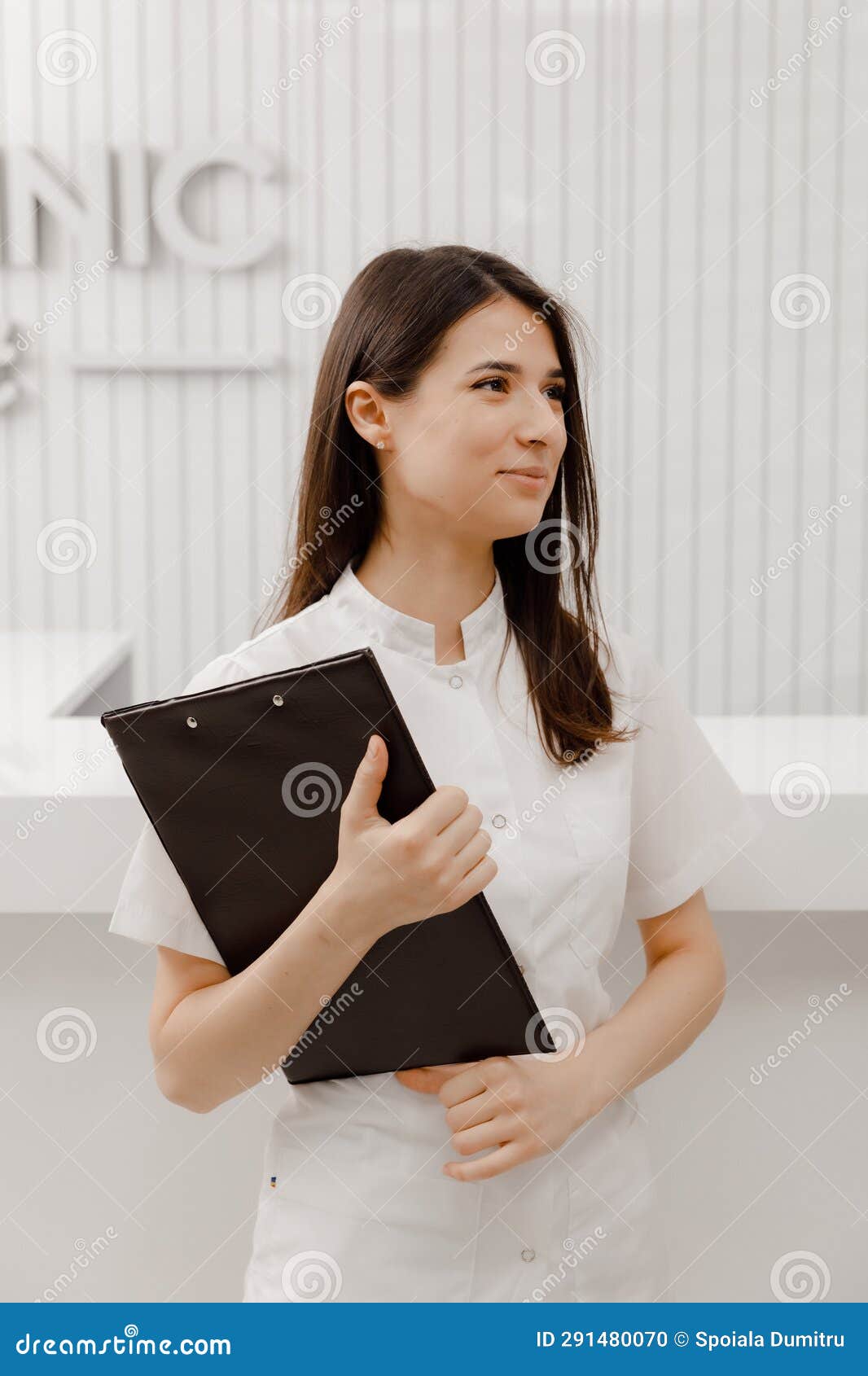 In Front of the Camera Beautiful Medical Assistant Posing To the Camera ...